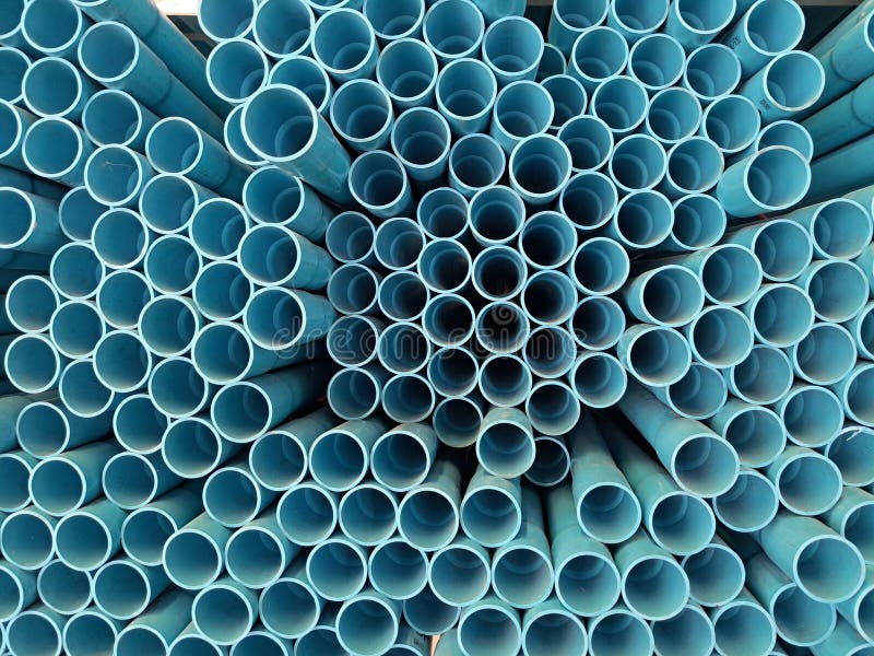 Pvc Pipes Background.Stacked Plastic Pipes in a Warehouse Stock Image ...