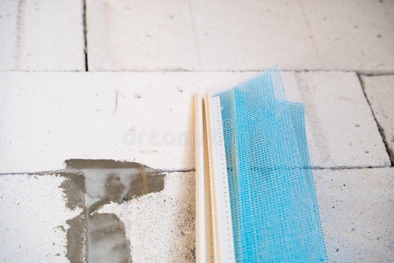 PVC Window Profile with Cuff and Mesh Close-up at a Construction Site ...