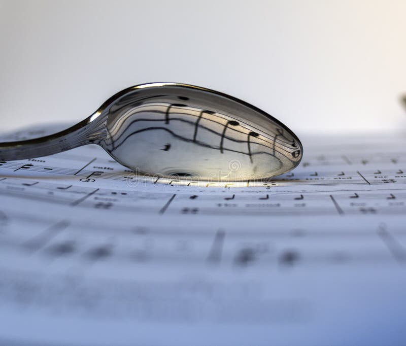 Musical Notes Reflect Off the Spoon Stock Photo - Image of reflection ...