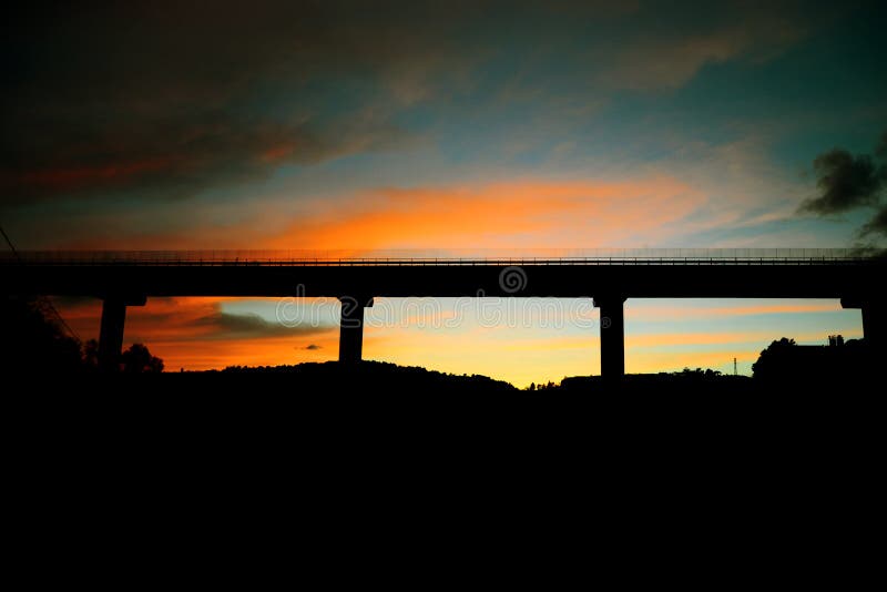 Pylon Bridge at Sunset. Paved Bridge at Sunset Stock Image - Image of ...