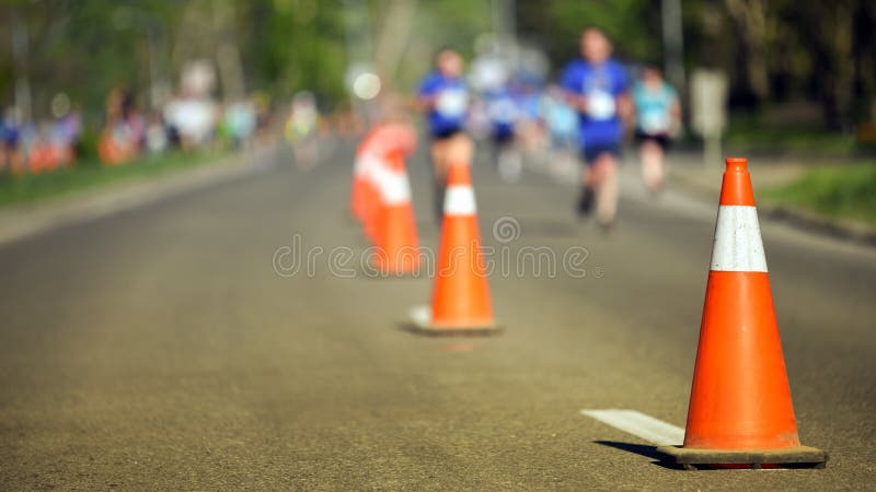 Pylon Cones during a Marathon with Runners Stock Photo - Image of cone ...