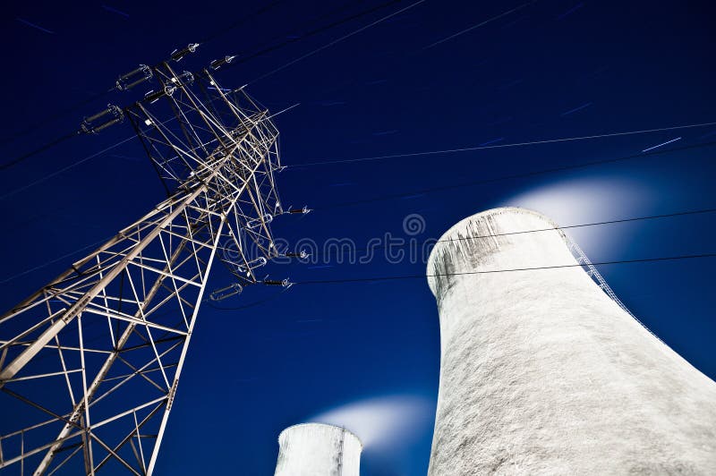 Pylon and cooling towers stock photo. Image of danger - 25382468