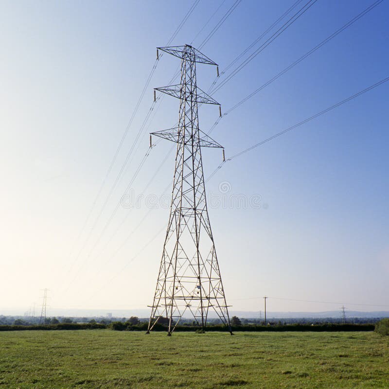 Electricity Pylon Towering Overhead Stock Photo - Image of overhead ...