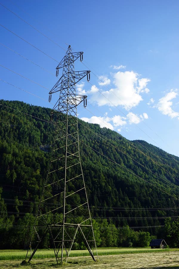 Pylon on the field stock image. Image of metal, woods - 76856447