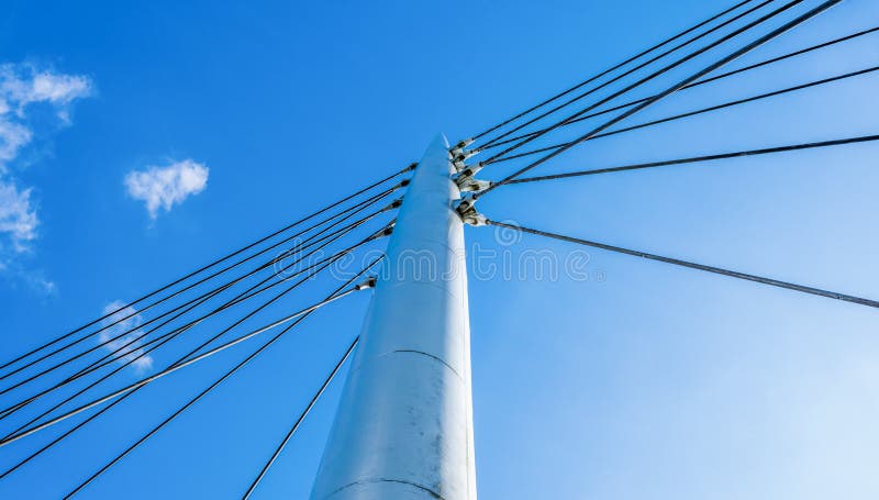 Pylon with Guy Wires Against a Blue Sky Stock Image - Image of rope ...