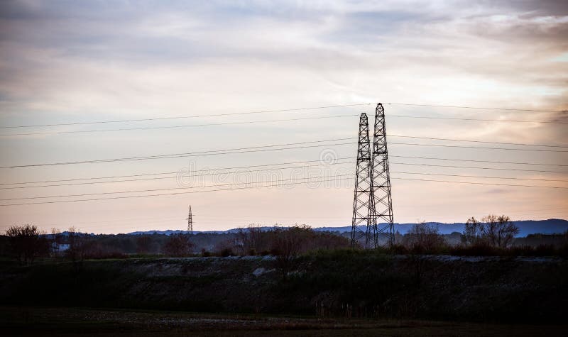 Pylon power at sunset stock image. Image of electric - 102796781