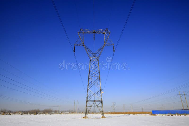 Pylon in the snow stock image. Image of blue, industry - 366305547