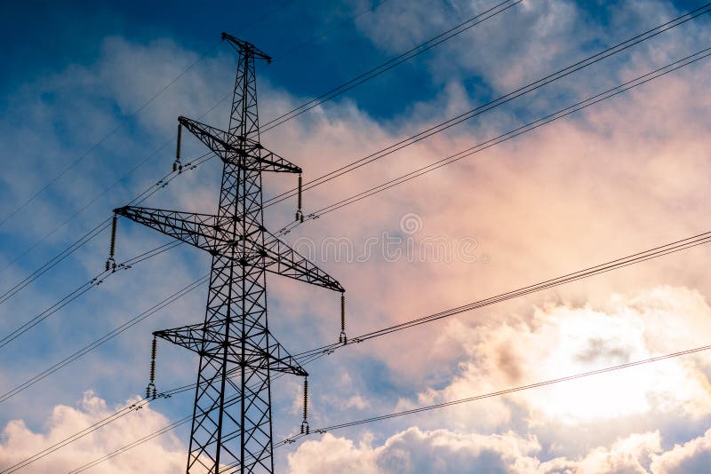 Pylon and Transmission Power Line in Summer at Sunset. Stock Photo ...