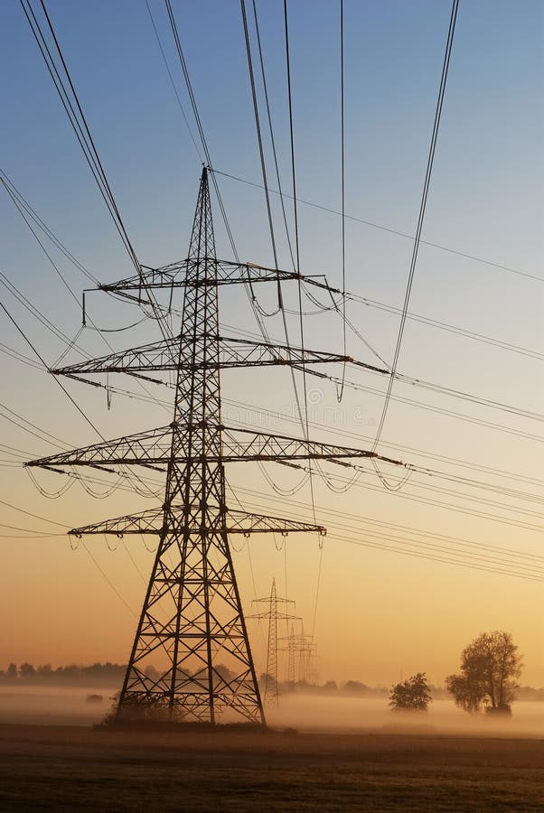 Pylons stock photo. Image of energy, cable, sunset, outdoors - 6975454