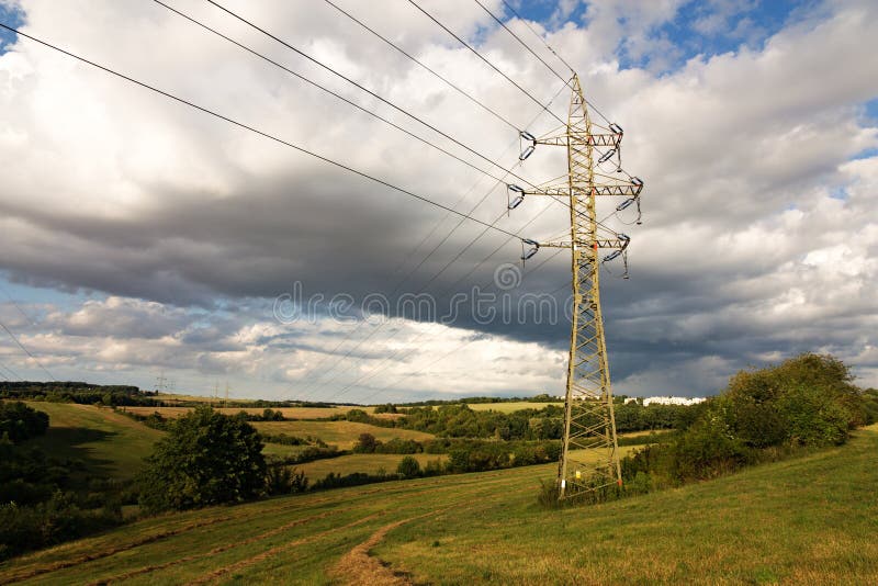 Pylons in countryside stock image. Image of pylon, grid - 43607669