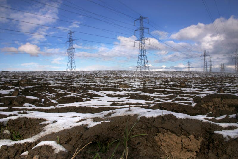 Pylons in field stock image. Image of field, ploughed - 1362523