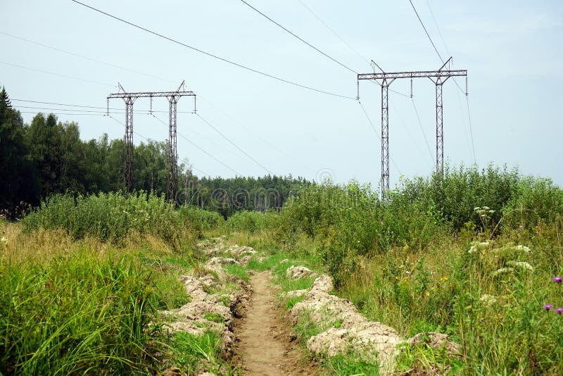 Pylons and footpath stock image. Image of bush, metal - 122797465
