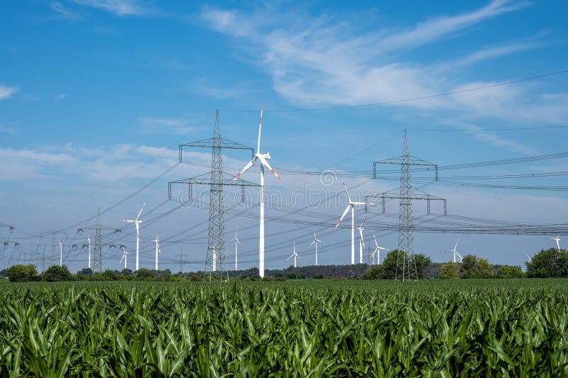 Pylons, Power Lines and Wind Turbines Stock Photo - Image of power ...