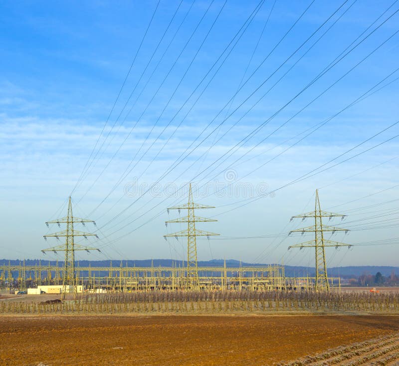 Pylons in rural landscape stock image. Image of bale - 35074943