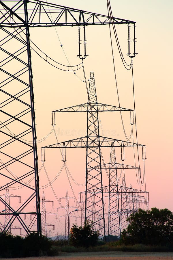 Pylons after Sunset stock photo. Image of high, voltage - 32849898