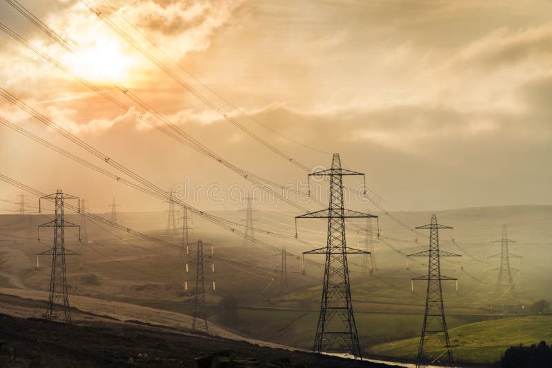 Pylons at sunset stock image. Image of sunset, global - 90444027