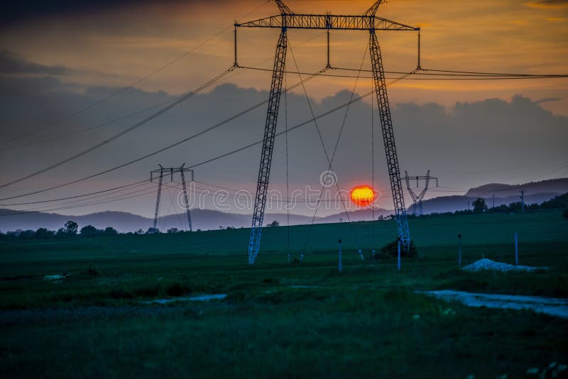 Pylons at the sunset stock image. Image of fieldn, birds - 165050189