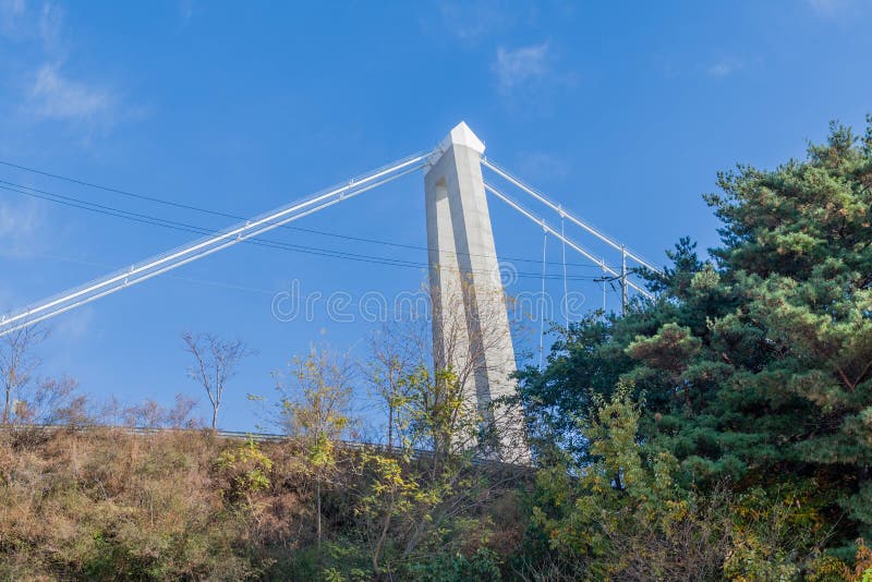 Pylons of Suspension Bridge Under Blue Sky Stock Photo - Image of cable ...