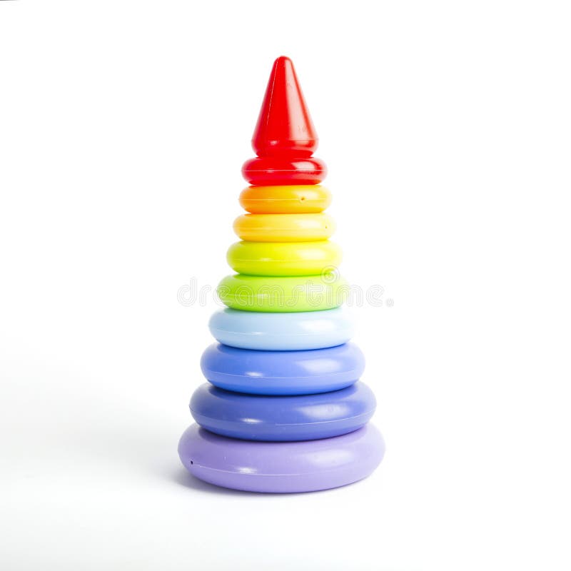 Pyramid Build from Colored Plastic Isolated on White Background. Stock ...