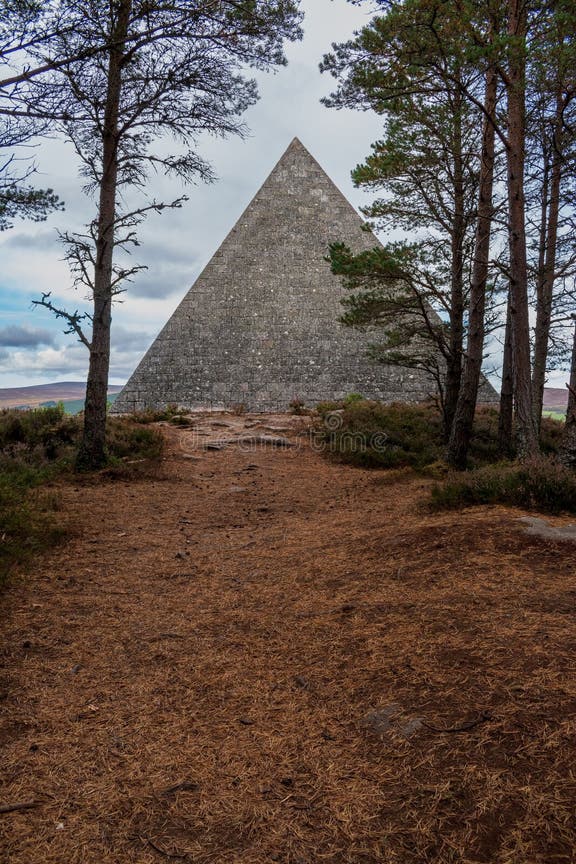 Pyramid Building Made with Bricks with Tall Trees Stock Image - Image ...