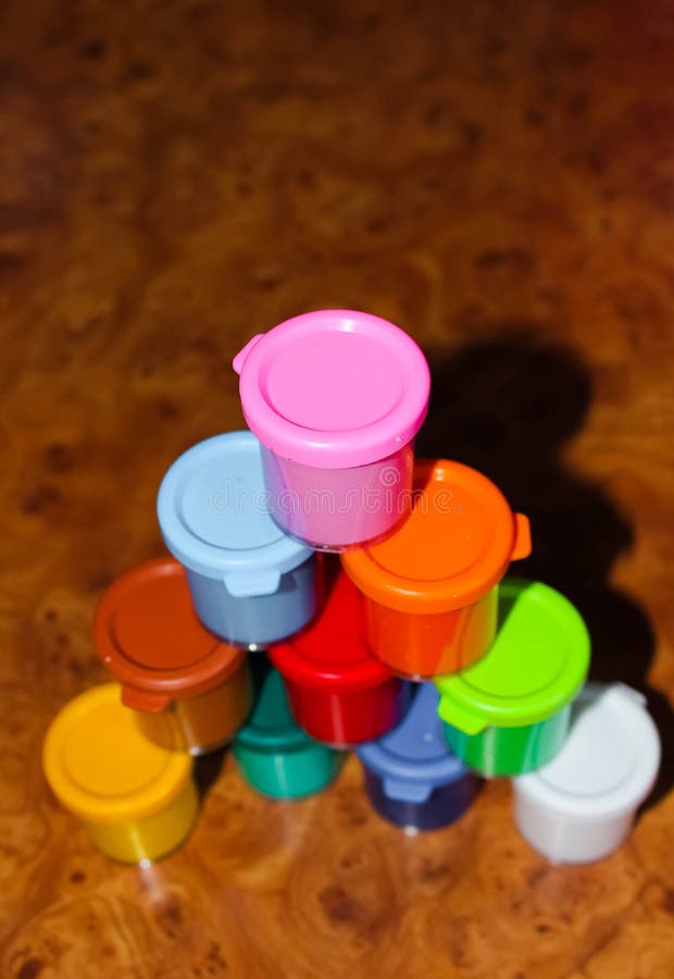 Pyramid Built from Colored Jars with Gouache Stock Photo - Image of ...