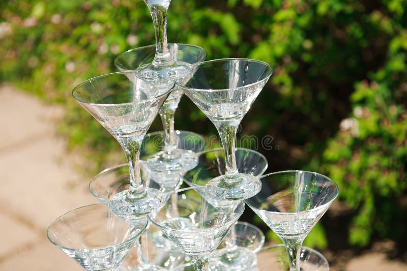 Pyramid of Glasses of Champagne. Hill. Pyramid of Champagne Outdoors in ...