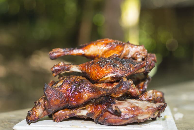 Pyramid of Grilled Duck Legs on the Board. Outdoor Barbeque Stock Image ...