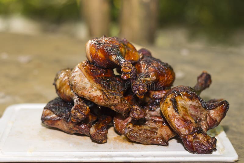 Pyramid of Grilled Duck Legs on the Board. Outdoor Barbeque Stock Photo ...