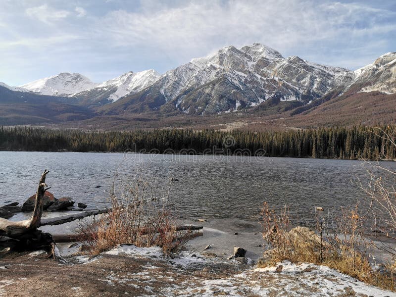 The Pyramid Island In Spring With Color Changing Background In Alberta ...