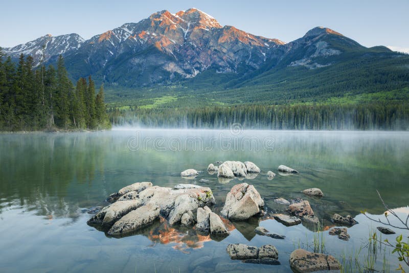 Pyramid Lake in Jasper National Park Stock Image - Image of sunny ...