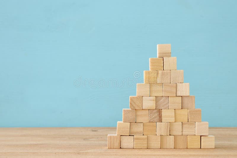 Pyramid Made from Wooden Cubes. Stock Photo - Image of manage, achieve ...