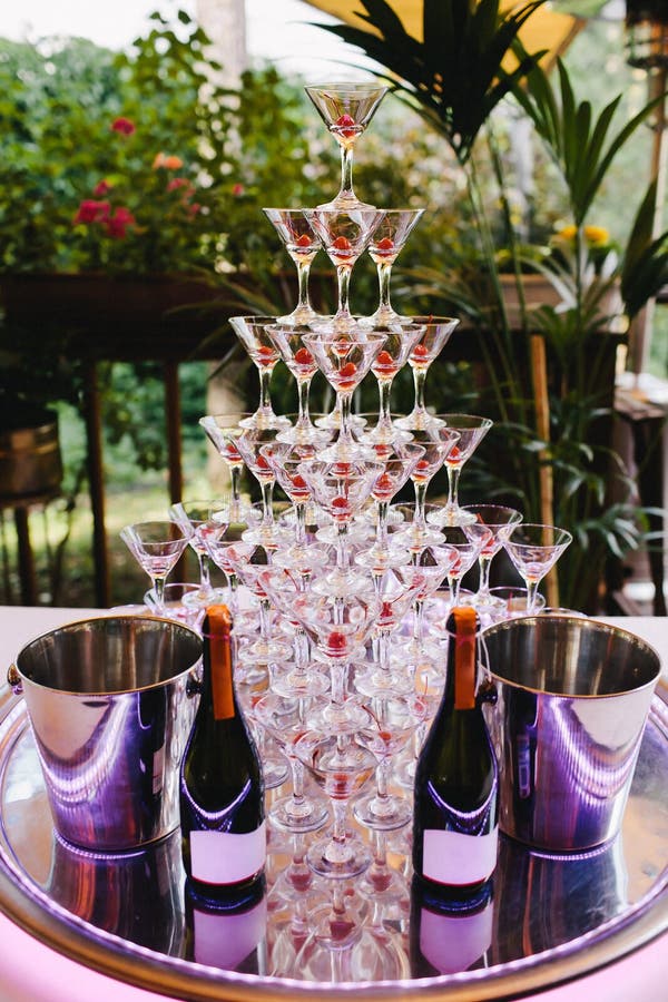 Pyramid of Martini Glasses with Cherries on the Wedding Table Stock ...