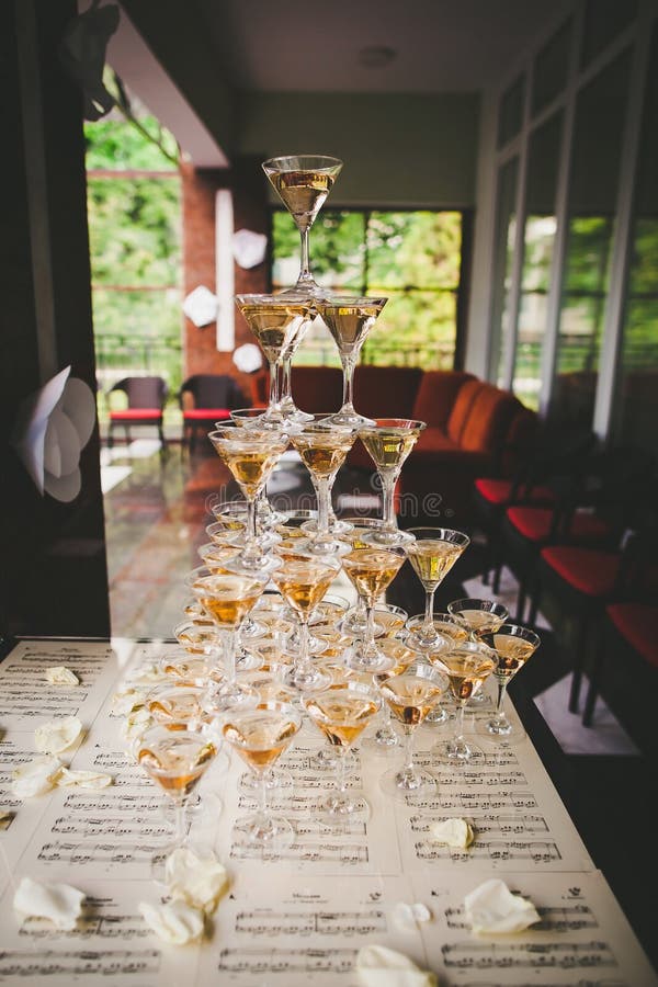 Pyramid of Martini Glasses on the Wedding Table Stock Photo - Image of ...