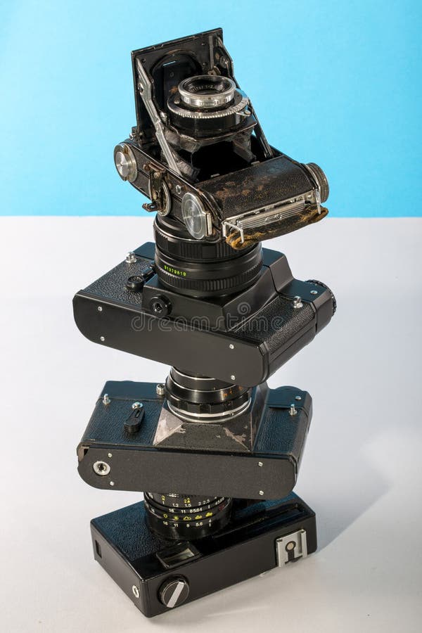 Pyramid from Old Film Cameras on a Colored Background Stock Photo ...