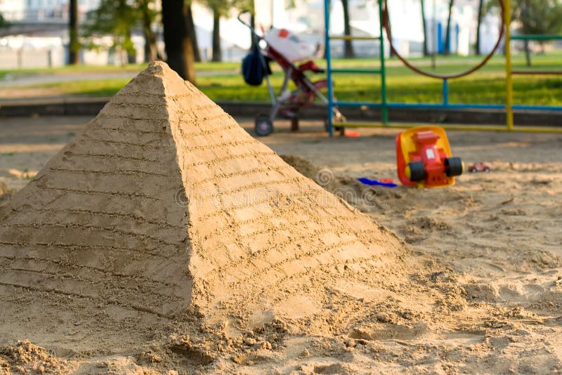 Pyramid Shaped Sand Castle stock photo. Image of sand - 3415540