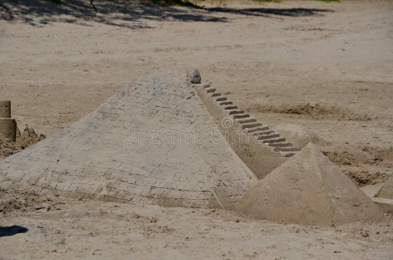 Pyramid Sand Castle on a Beach Stock Photo - Image of summer, model ...