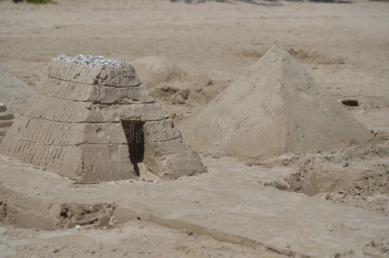 Pyramid Sand Castle on a Beach Stock Image - Image of creativity, tale ...