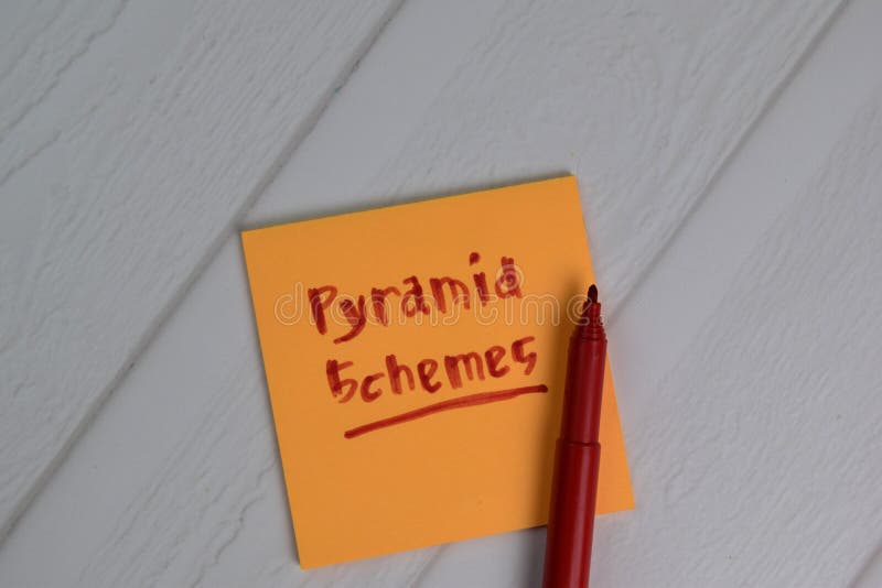 Pyramid Schemes Write on Sticky Notes Isolated on Office Desk Stock ...