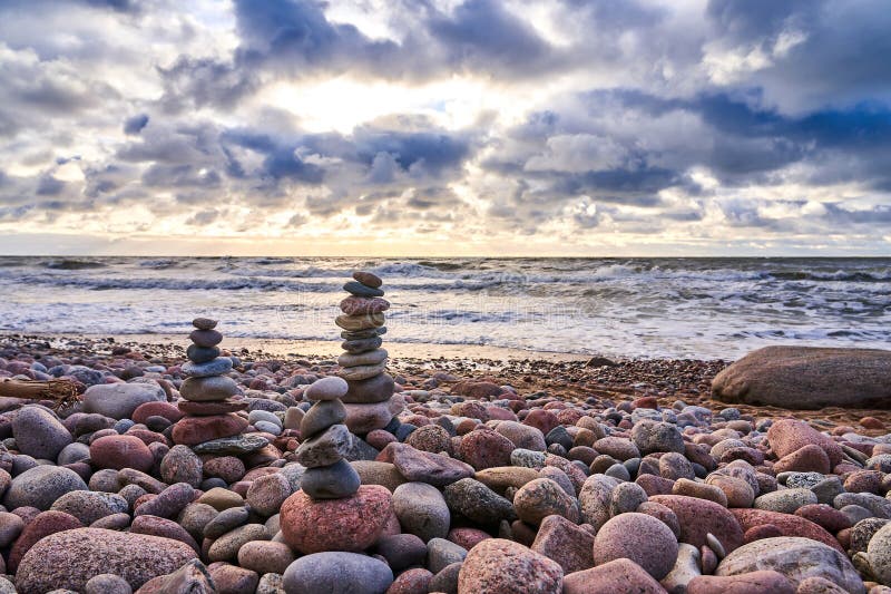 Pyramid of Sea Stones on Pebbles of the Sea Shore Stock Image - Image ...