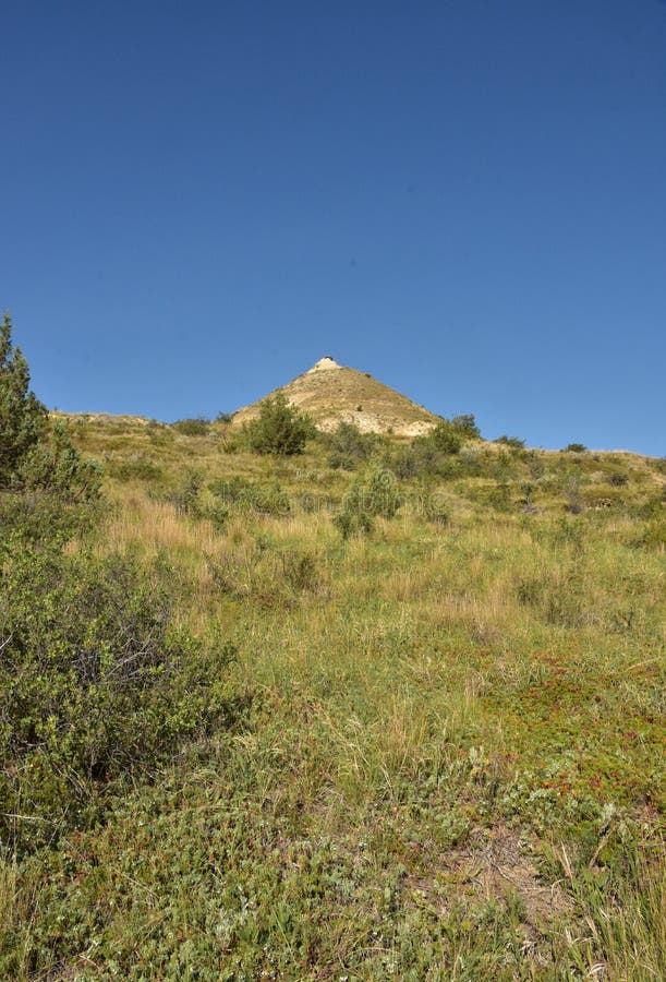 Pyramid Shaped Sandstone Rock Formation in the Badlands Stock Image ...