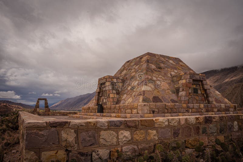 Pyramid-shaped Structure Stands Tall Against a Dramatic Backdrop of ...