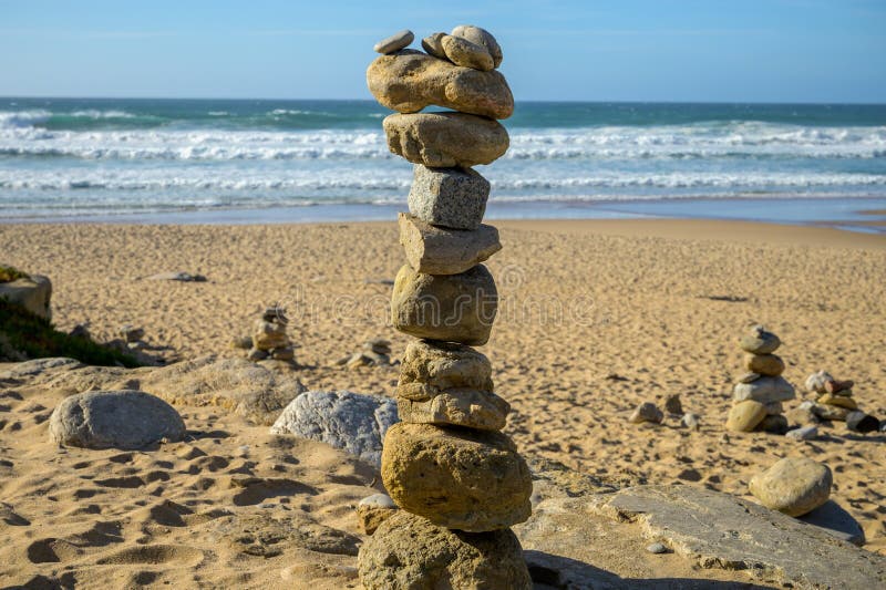 Pyramid from Stack Balanced Stones on Sandy Beach, Atlantic Ocean ...