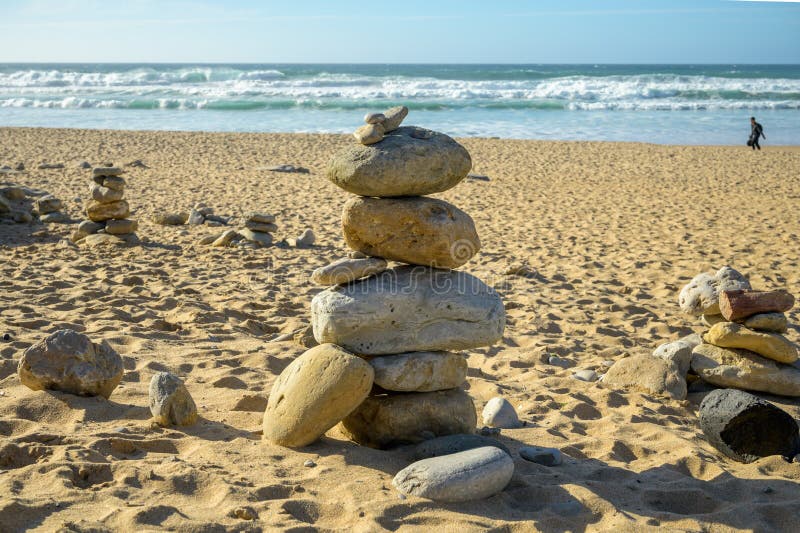 Pyramid from Stack Balanced Stones on Sandy Beach, Atlantic Ocean ...