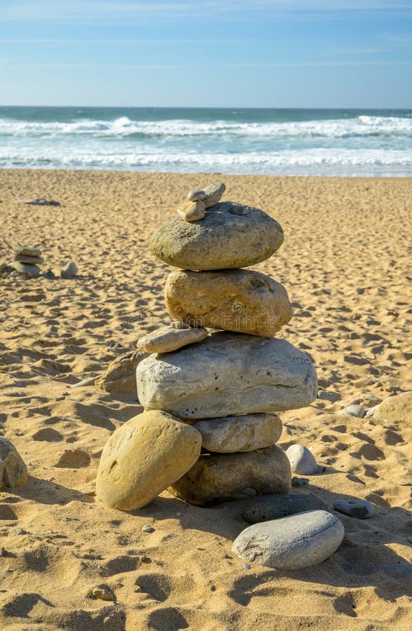 Pyramid from Stack Balanced Stones on Sandy Beach, Atlantic Ocean ...