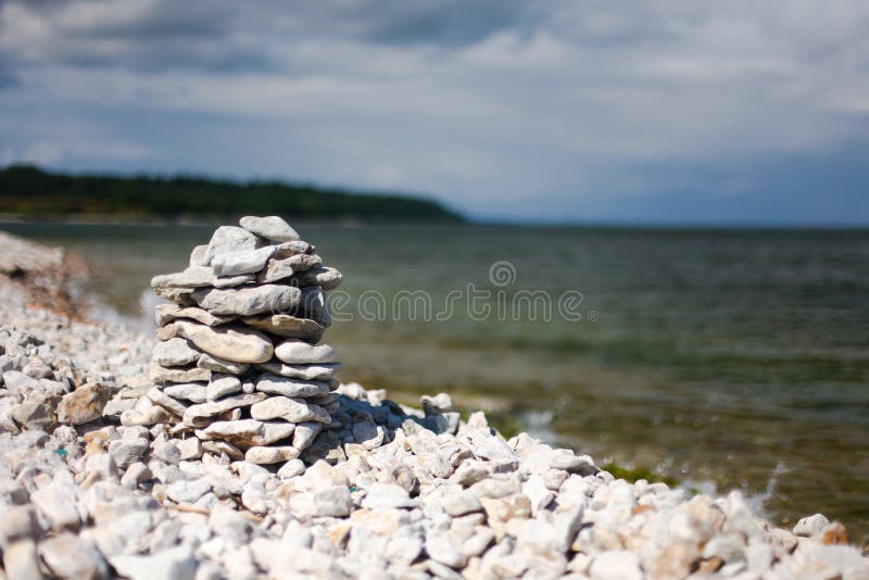 Pyramid of Stones on the Empty Beach Stock Image - Image of holiday ...