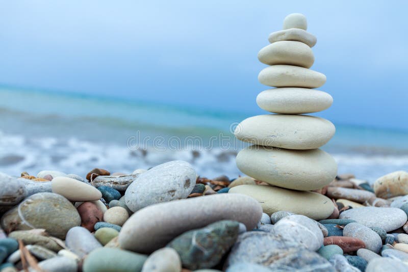 Pyramid of Stones Near Sea on Beach Stock Photo - Image of peaceful ...