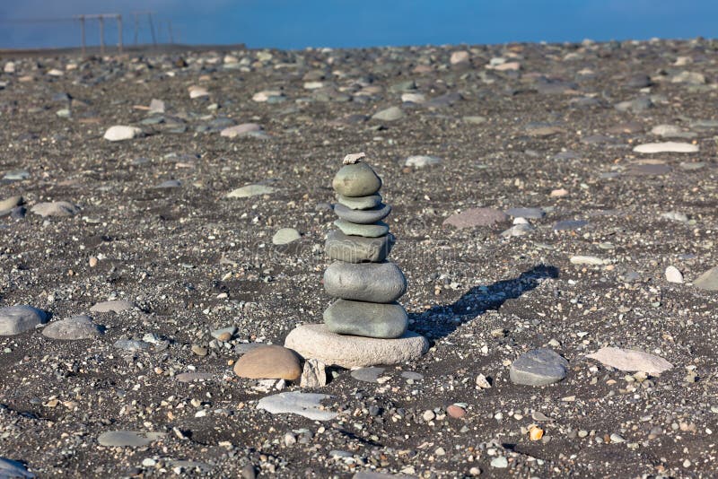 Pyramid from Stones at Volcanic Beach, Iceland. Stock Image - Image of ...