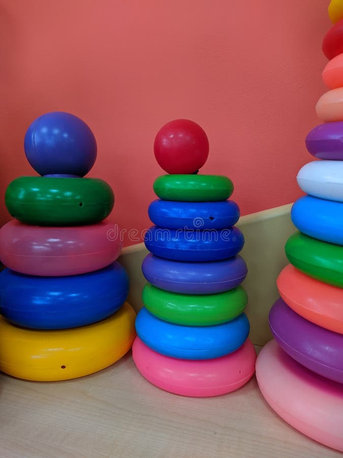 Pyramid Toys with Colored Plastic Rings Stock Photo - Image of isolated ...