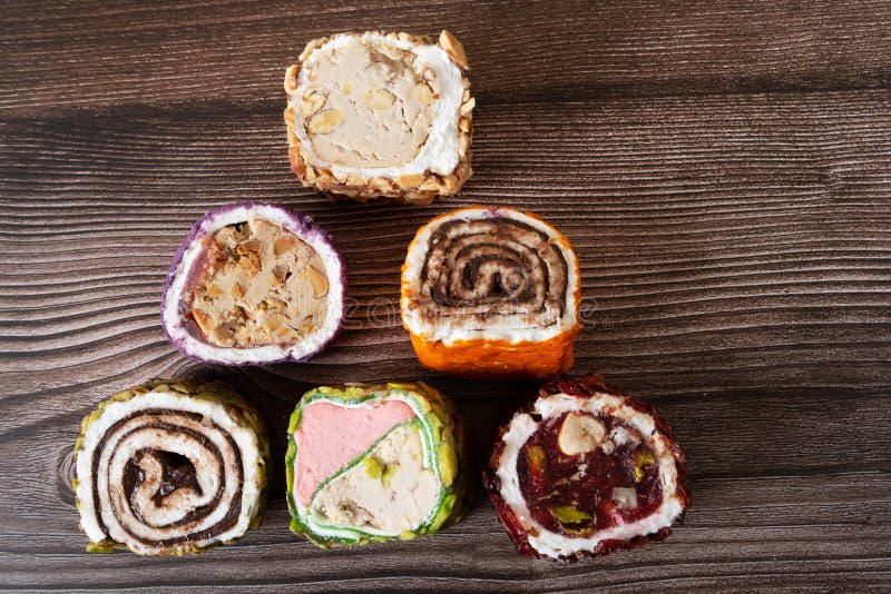 A Pyramid of Traditional Turkish Sweets on a Wooden Table Stock Image ...