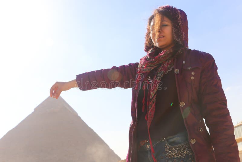Pyramid and woman stock image. Image of shisha, east - 97519603
